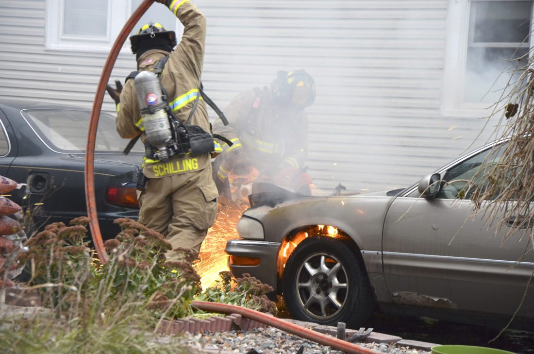 Firefighters cut open car hood to battle blaze | News, Sports, Jobs ...